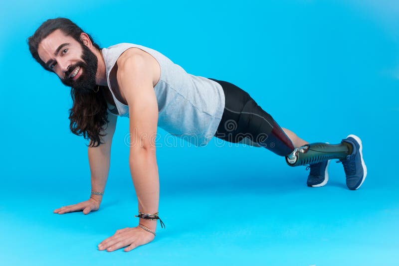Man with a Prosthetic Leg Doing Push-ups on the Floor Stock Photo ...