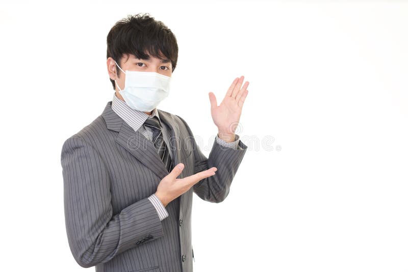 Man wearing a flu mask stock photo. Image of company - 113605054