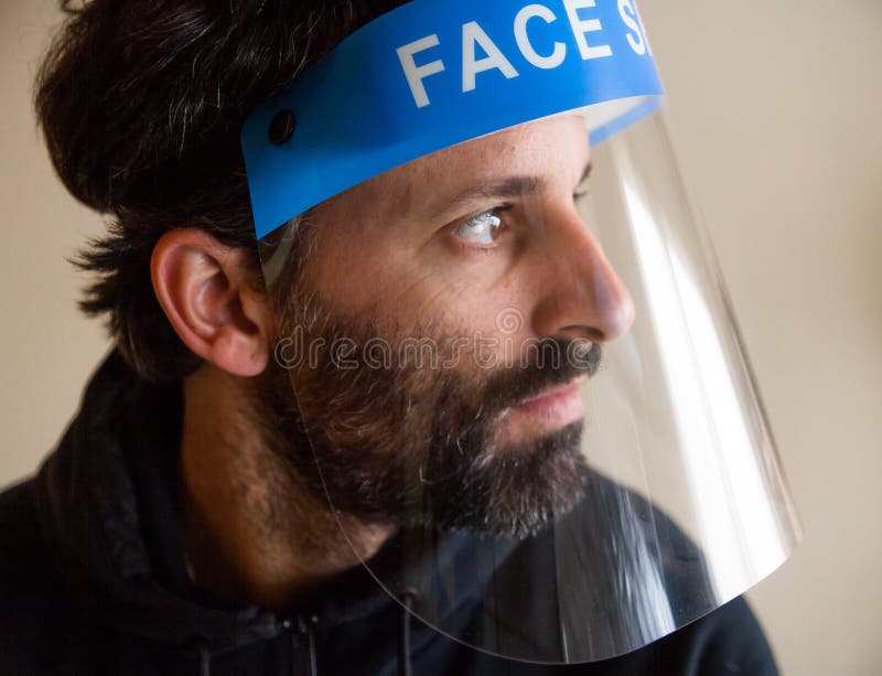 Man with Protection Face Shield Against Coronavirus Stock Image - Image ...