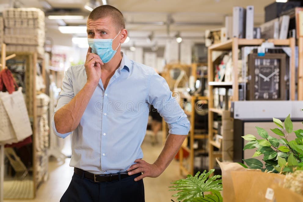 Man in Protective Mask Inspects Goods in Hardware Store Stock Image ...