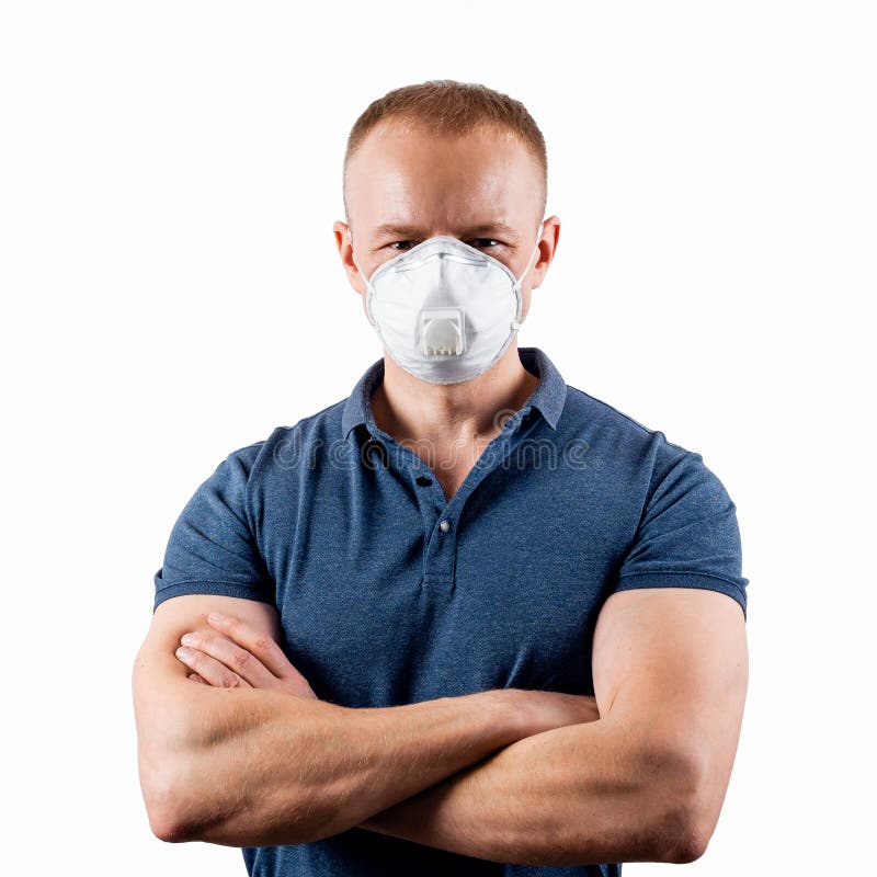 Man in a Protective Mask Isolated on a White Background. Stock Photo ...