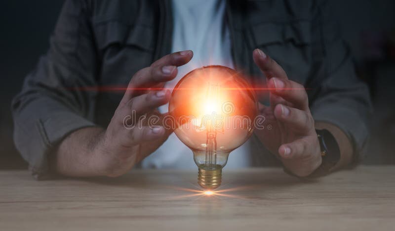 Man Protects Light Bulb, Creative New Idea. Innovation, Brainstorming ...