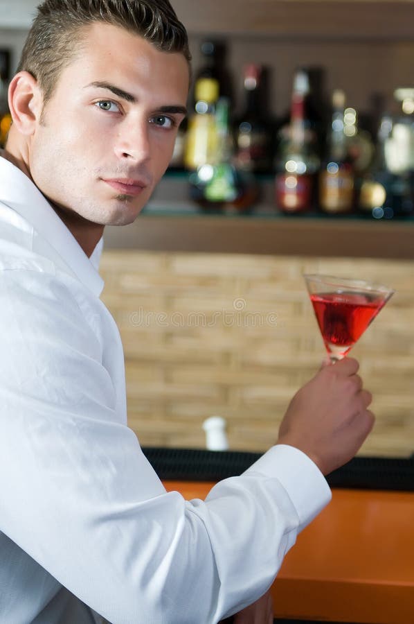 Man in a Pub with Red Martini Stock Image - Image of glamourous ...