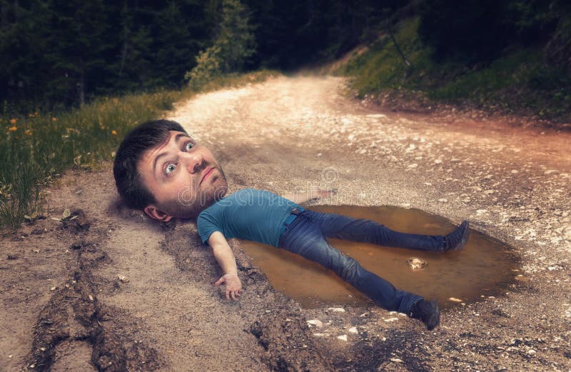 Man in the puddle stock photo. Image of huge, plant, rain - 64439898