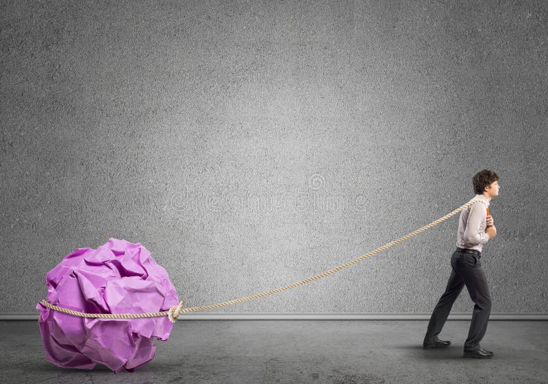 Man Pulling with Effort Big Crumpled Ball of Paper As Creativity Sign ...