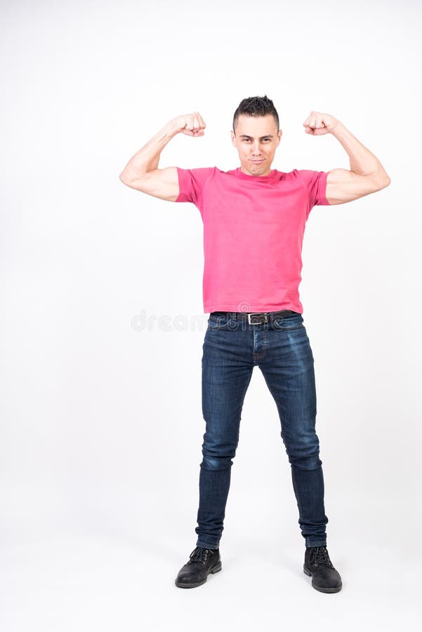Man pulling out biceps stock photo. Image of isolated - 178685246