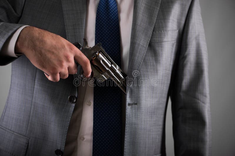 The Man Pulling Out Gun from His Pocket Stock Photo - Image of firearm ...