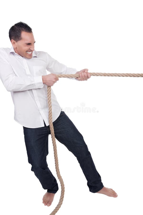 Man pulling on a rope stock image. Image of contest, rope - 30657007