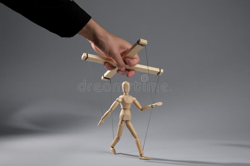 220 Man Holding Puppet Strings Stock Photos - Free & Royalty-Free Stock ...