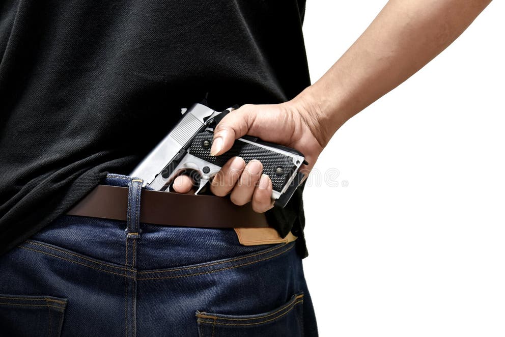 The man pulls out a gun stock image. Image of back, confident - 91023543