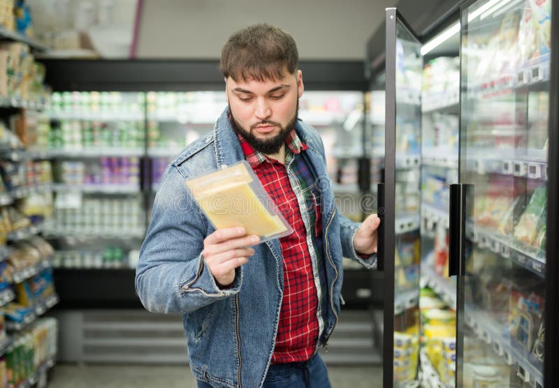 Man purchasing cheese stock photo. Image of foodstuff - 248627170