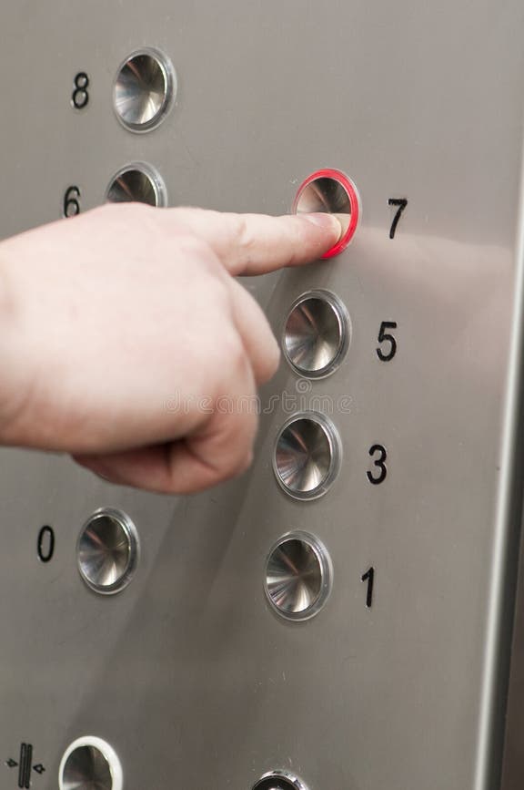 Man Pushing Buttons on an Elevator Stock Photo - Image of numbers ...
