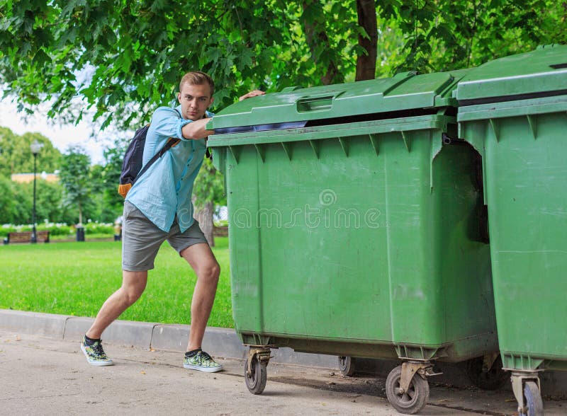 Pushing Wheelie Bin Stock Photos - Free & Royalty-Free Stock Photos ...