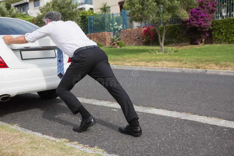 Man Pushing Car Stock Images - Download 645 Royalty Free Photos