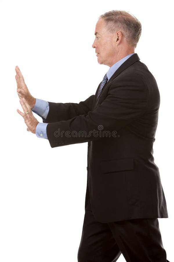 Man pushing an object stock image. Image of looking, grey - 26957175