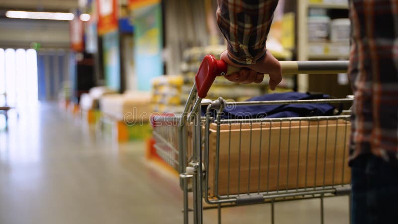 A Man Pushing Trolley on Escalator in Hardware Store Stock Video ...