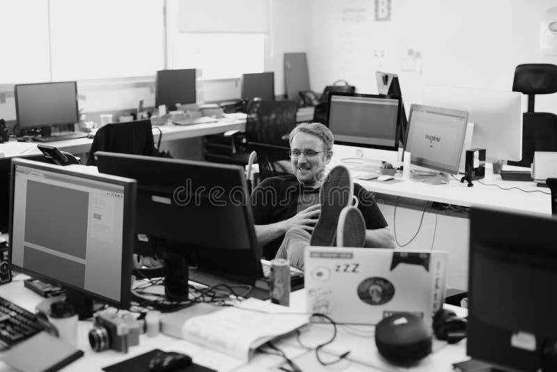 Man Put Feet Up on Work Table during Break Time at Office Stock Image ...