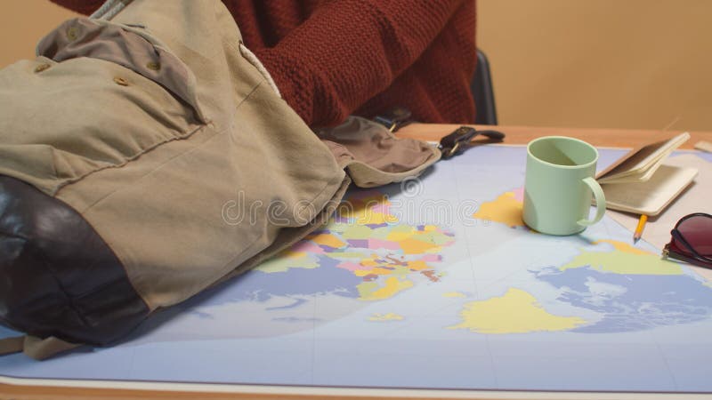 Man Puts Different Things in a Rag Backpack Stock Photo - Image of ...