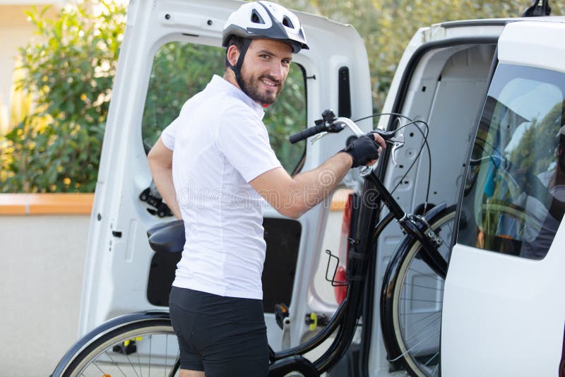 Man Puts Fixed Bicycle in Car Trunk Stock Photo - Image of hipster ...