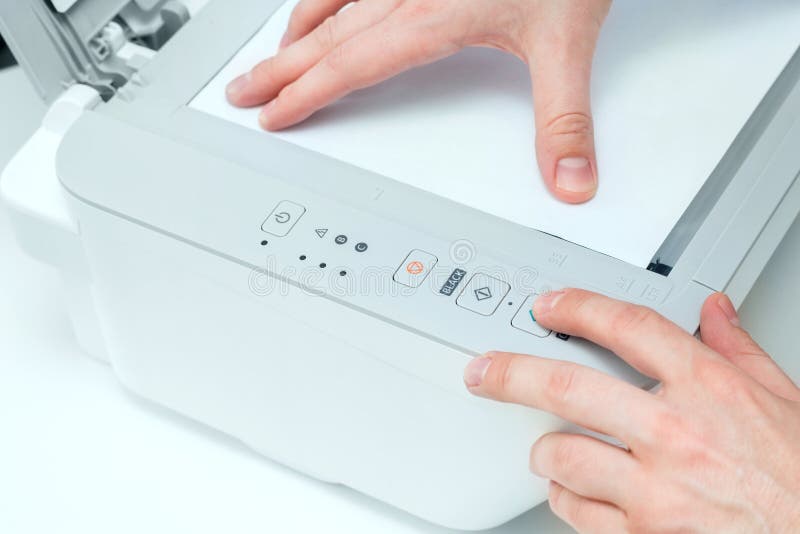 Man Puts Start Button on Scanner. Stock Photo - Image of document ...