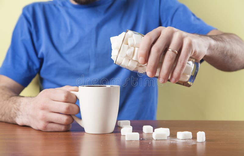 Man Puts Sugar Cubes on Coffee Cup Stock Photo - Image of nutrition ...