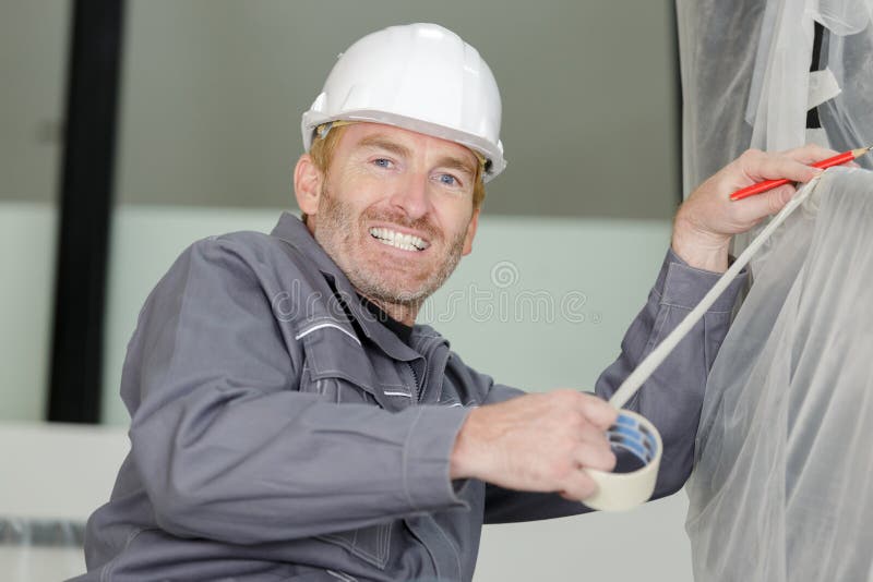 Man Putting Adhesive Tape and Preparing for Painting Stock Image ...