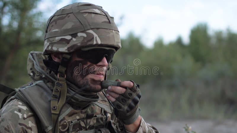 Man Putting Camouflage on Face Stock Photo - Image of rifle, force ...
