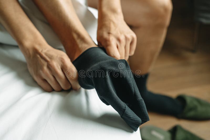 Sitting Edge Bed Putting Black Heels Stock Photos - Free & Royalty-Free ...