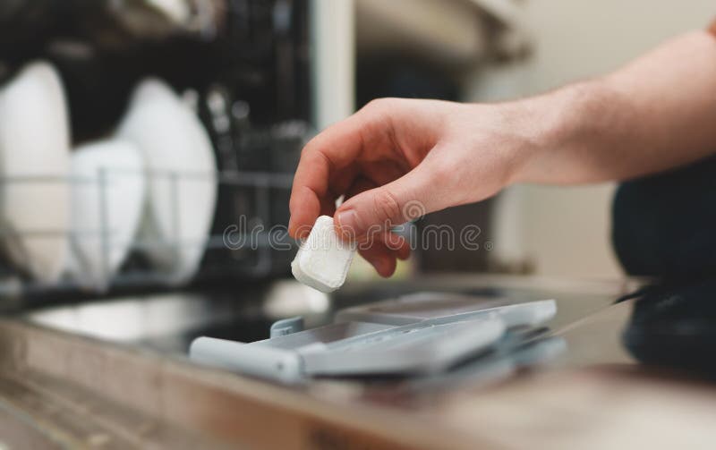 Man Putting Detergent Tablet Stock Image - Image of chemical, clean ...