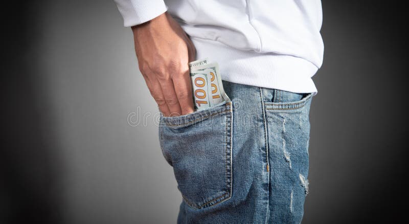 Man Putting Dollar into the Pocket Stock Photo - Image of success ...