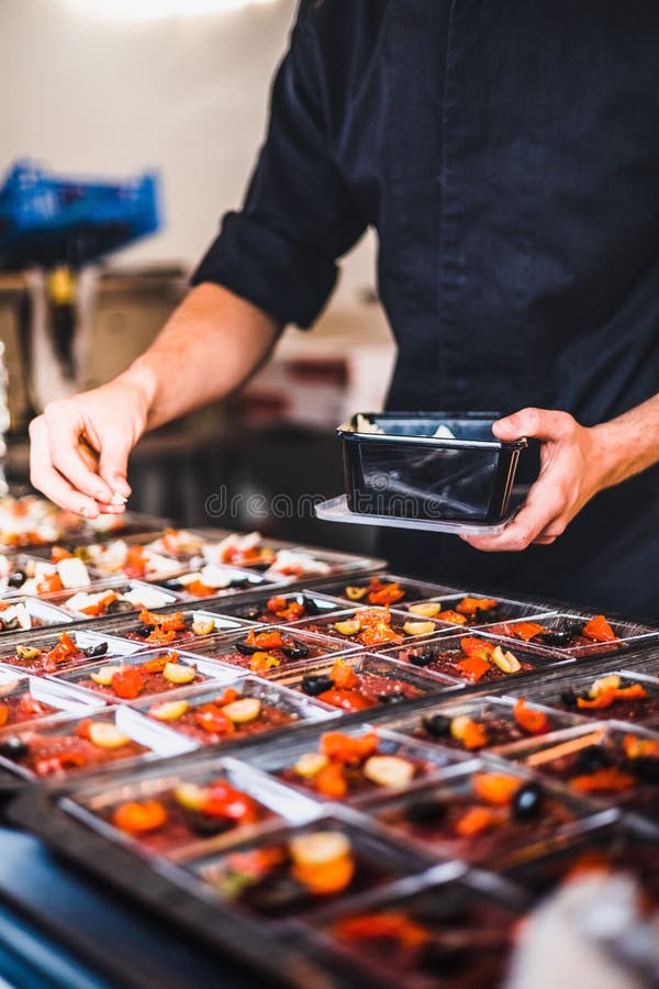 Man Putting Food on the Plate Stock Photo - Image of meal, lunch: 262443732