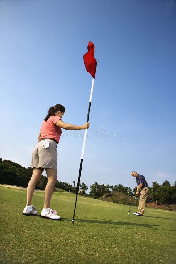 Man Putting at Golf Course. Stock Image - Image of play, game: 2038323