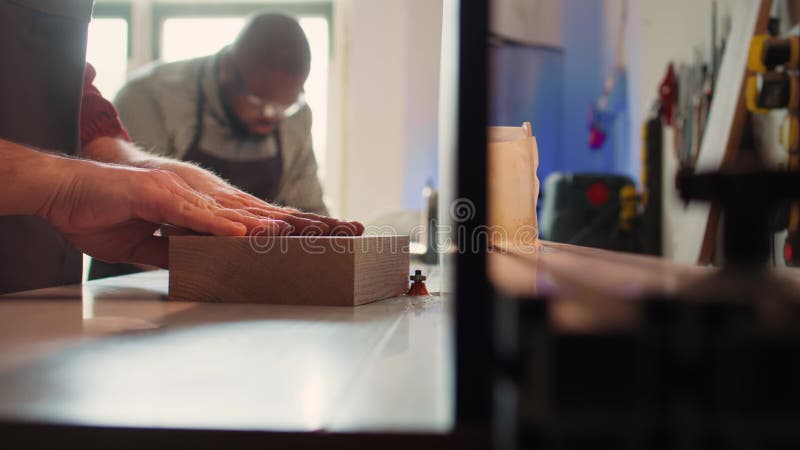 Man Putting Lumber Block through Spindle Moulder, Creating Smooth Edges ...