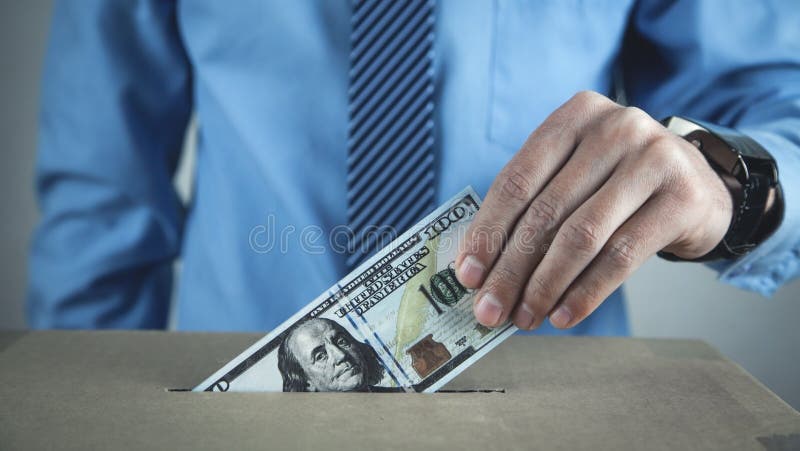 Man Putting Money on Cardboard Box. Save Money Stock Image - Image of ...