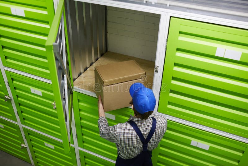 Worker Putting Box Shelf Warehouse Stock Photos - Free & Royalty-Free ...