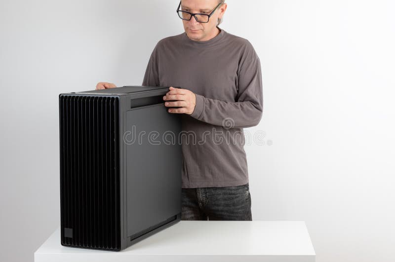 Man Putting To Table Heavy PC Case, Weight 15,8 Kg, Empty Big Tower ...