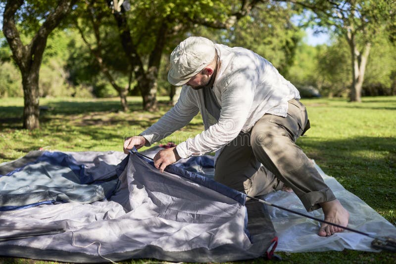 Man Putting Up Poles His Tent Process Setting Stock Photos - Free ...