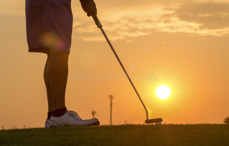Man Puttinging Golf Against Sunset Stock Image - Image of play, golfer ...