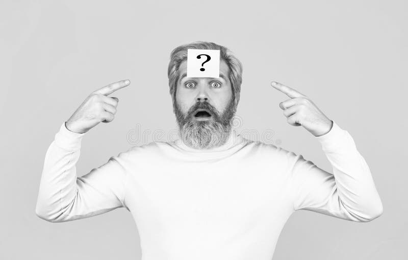 Man with Question Mark on Forehead Looking Up. Paper Notes with ...
