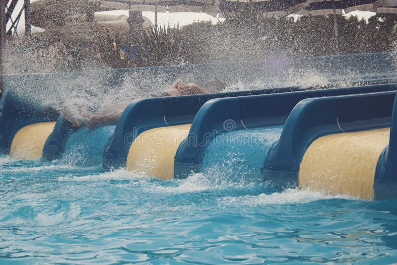 The Man Quickly Slides Down the Blue Water Slide Editorial Photo ...