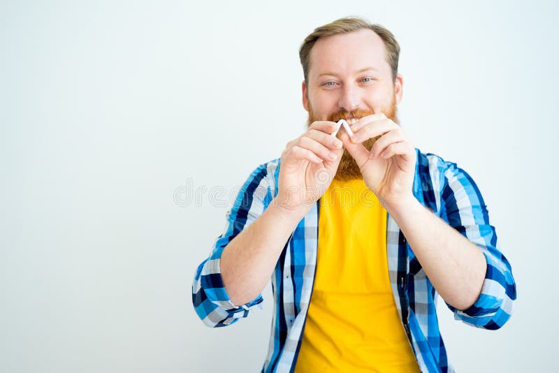 Man quitting smoking stock photo. Image of headshot - 105646394