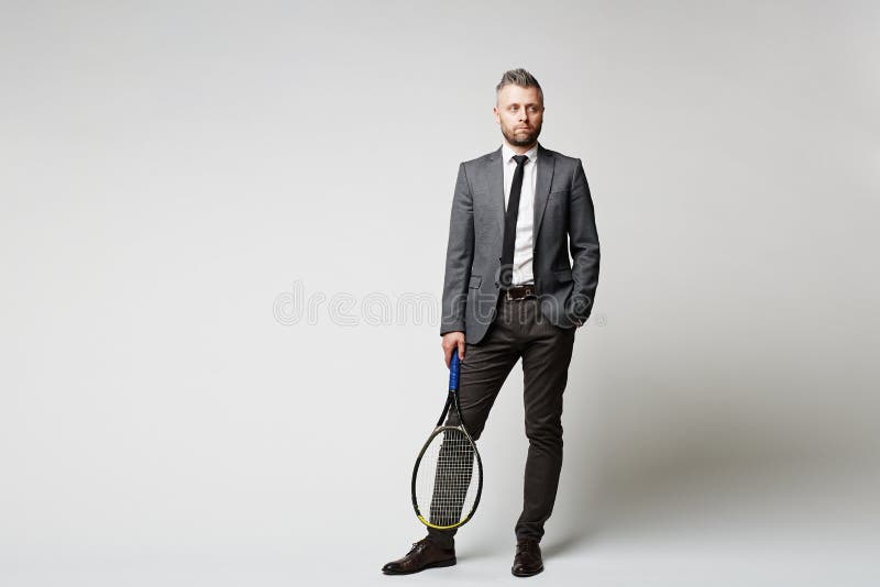 Man with racket stock photo. Image of tennis, businessman - 74185528