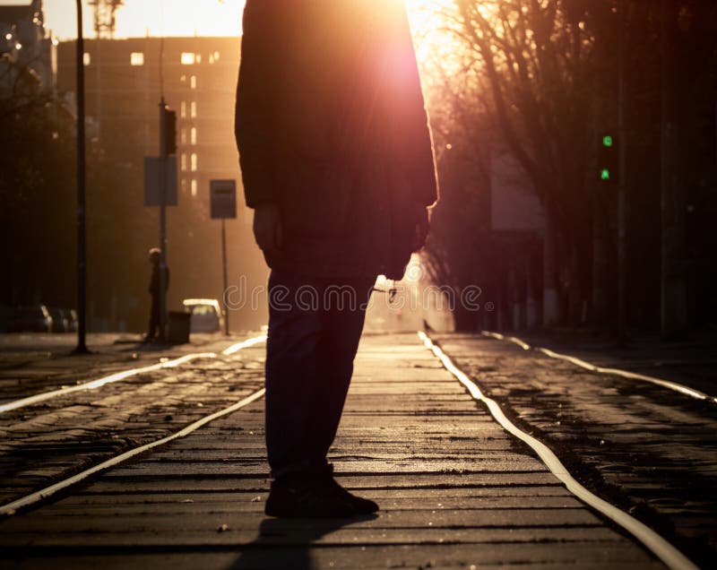 Man on the rails. stock image. Image of mysterious, eerie - 180889845