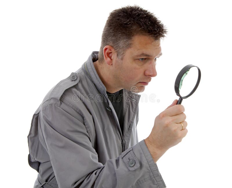 Man with Raincoat is Looking with Magnifying Glass Over White Ba Stock ...