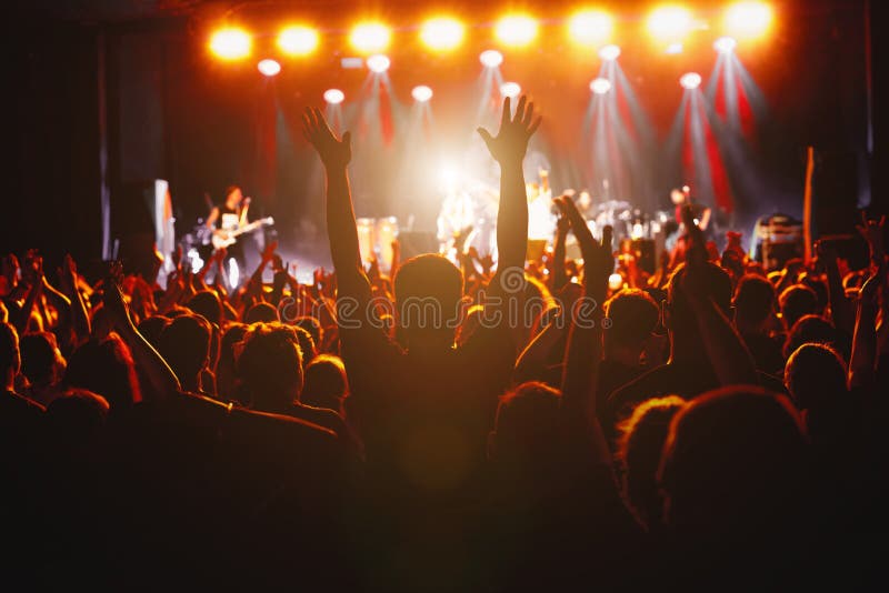The Man with Raised Hands during the Music Concert. Crowd and Stage ...