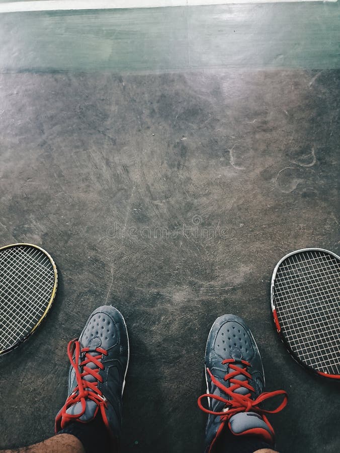 A Man with the Raket after Playing Badminton Stock Photo - Image of ...