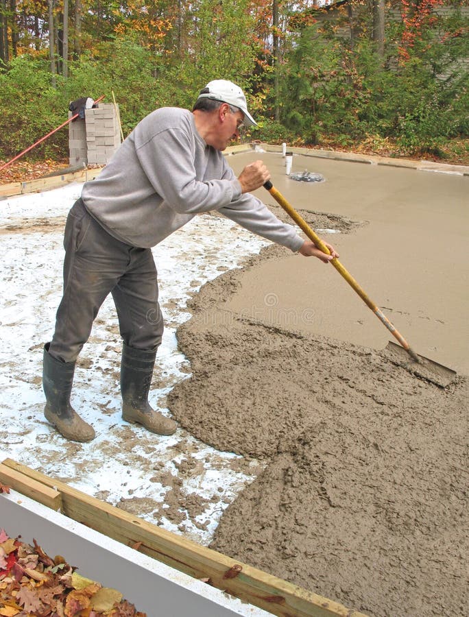Man raking concrete stock photo. Image of work, pour, occupation - 6847200