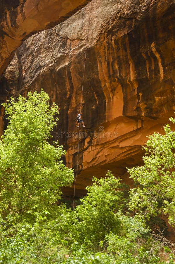 Man Rappelling Down a Cliff Stock Image - Image of landscape, colorado ...