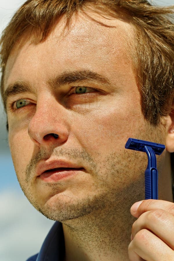 Man with razorblade. stock image. Image of human, razorblade - 25335369