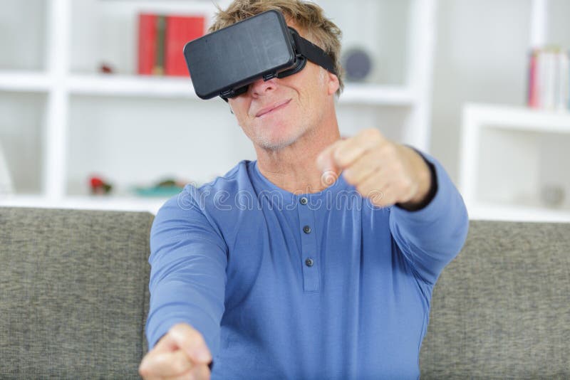 Man Reaches Forward Wearing Virtual Reality Headset Stock Photo - Image ...